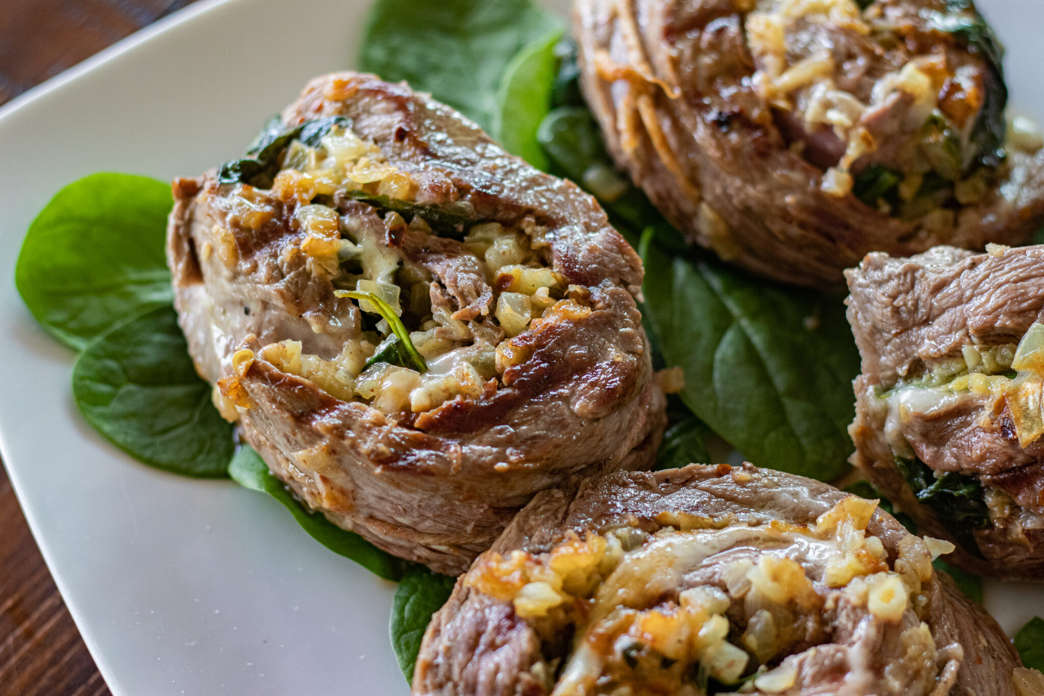 Beef Pinwheels with Caramelized Onions - Belqui's Twist